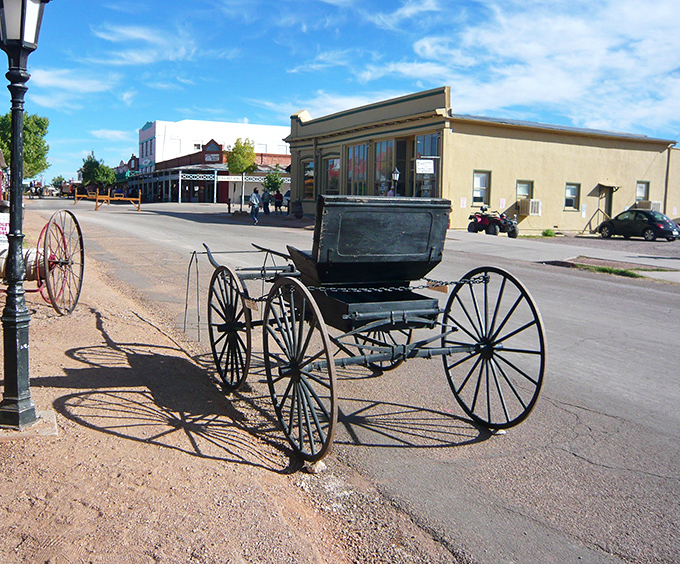 A horse-drawn carriage waits patiently on Tombstone's dusty street, ready to transport visitors back to the 1880s.