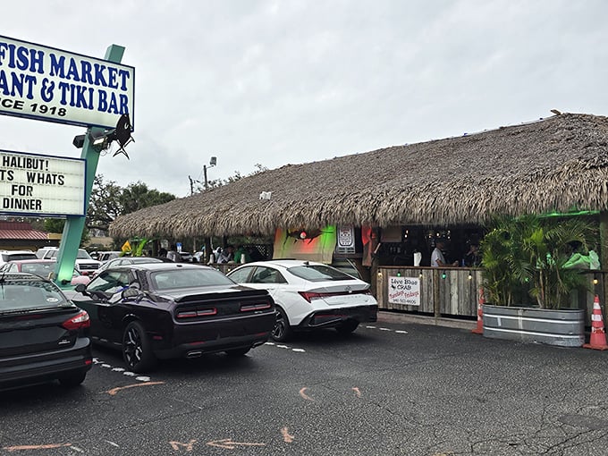 Walt's Fish Market's thatched roof tiki bar isn't just for show &ndash; it's where seafood dreams and cold drinks come together perfectly.