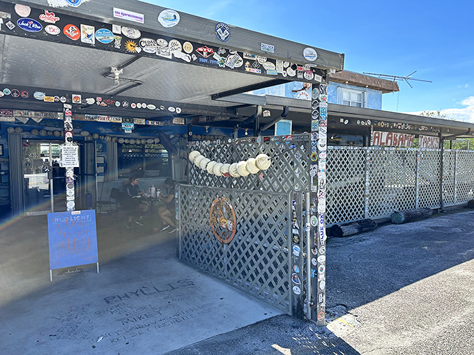 Sticker-covered lattice and motorcycle parking—Alabama Jacks embraces its no-frills personality while serving some of the Keys' best conch fritters.