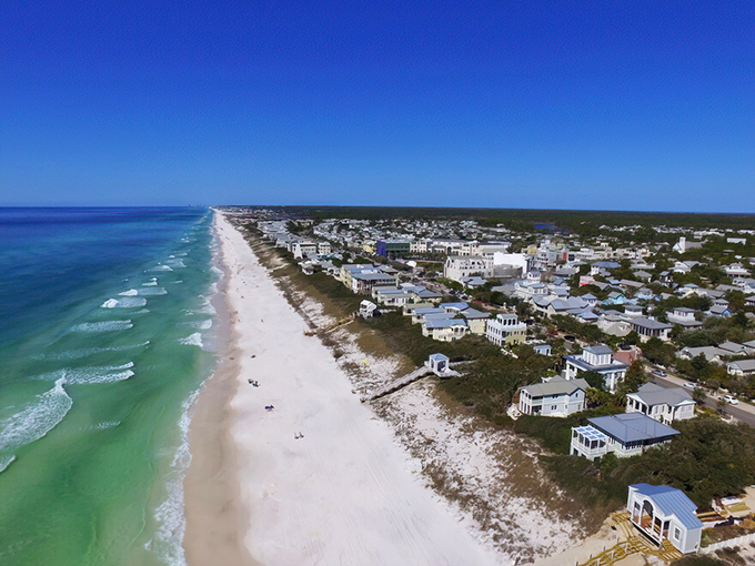 Aerial view of Apalachicola's coastline stretching into the distance. Miles of unspoiled beach waiting for footprints.