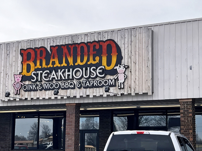That sign says it all &ndash; "Oink & Moo" &ndash; where cartoon livestock promise serious business when it comes to steaks and BBQ.