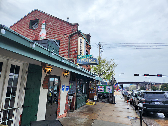 Rain or shine, Broadway Oyster Bar's exterior promises what New Orleans whispers: good times and better food await inside.