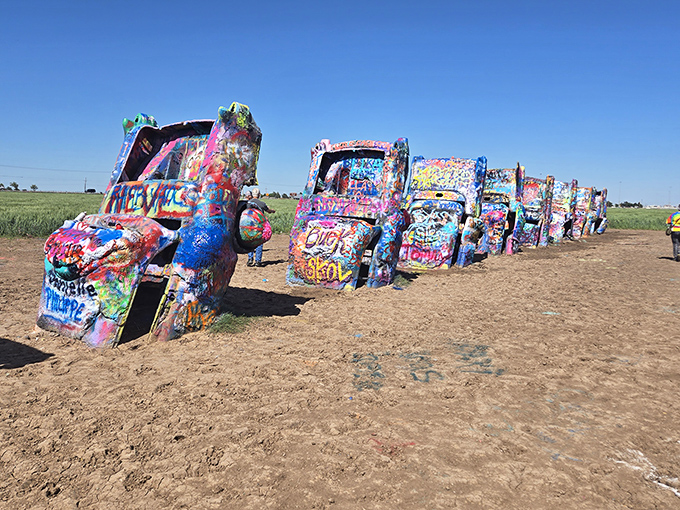 The ultimate canvas for road-tripping artists. Each layer of paint tells a story of travelers passing through this iconic Amarillo landmark.