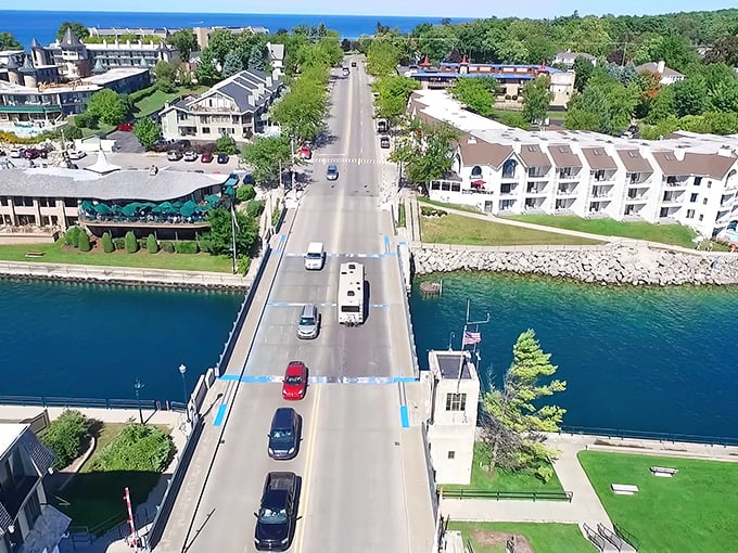 The iconic drawbridge welcomes boaters into Charlevoix's heart, where time slows down and worries drift away with the current.