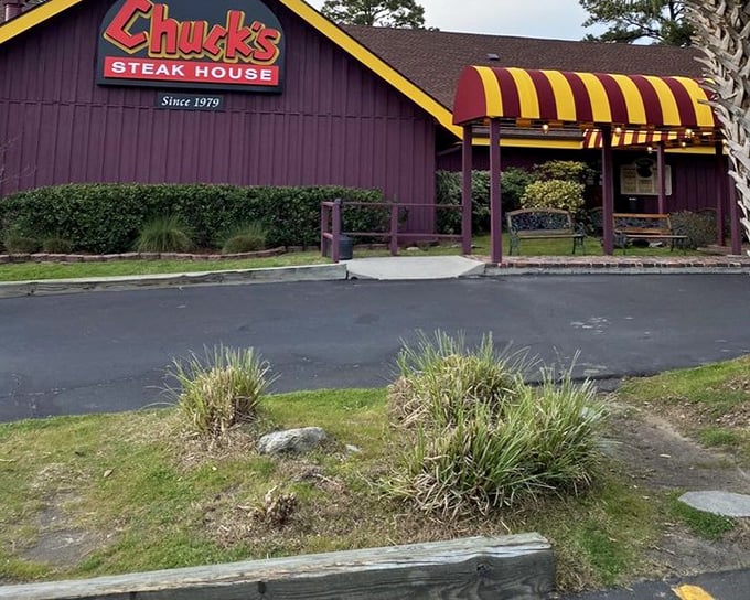 The red and yellow awning welcomes you like an old friend. Inside, wood-paneled walls hold decades of happy dining memories.