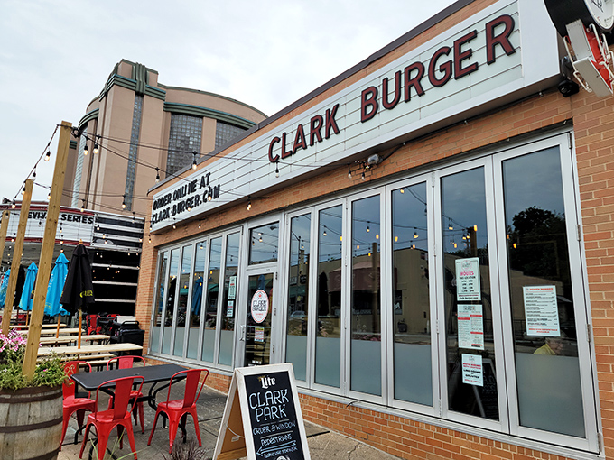 The brick exterior of Clark Burger feels like a secret clubhouse for burger enthusiasts. Those glass doors are portals to patty paradise!