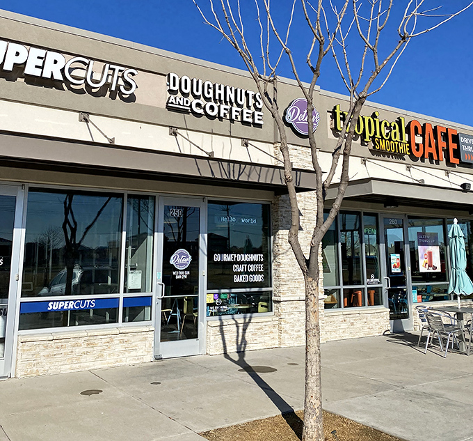 Nestled between everyday shops, this donut oasis proves that sometimes the best treasures are hiding in plain sight.