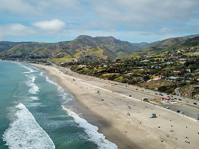 Where Malibu's coastline stretches like a postcard come to life, with waves gently kissing the shore.