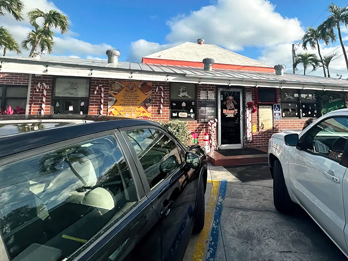 Palm trees and parked cars frame this unassuming Cuban gem &ndash; proof that the best food often comes from the simplest places.