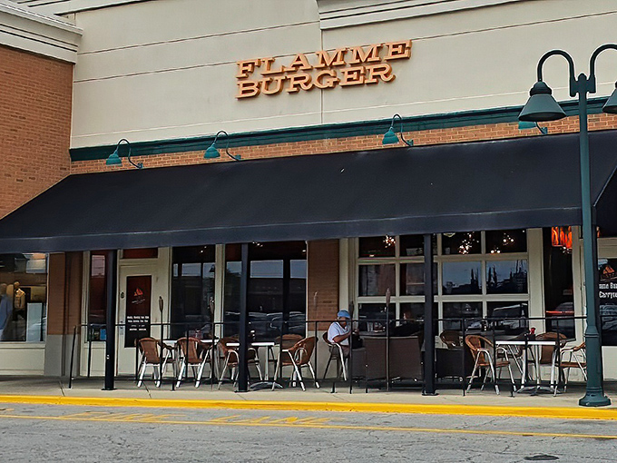 Outdoor seating at Flamme Burger – where summer evenings and juicy patties create Indiana's version of paradise.