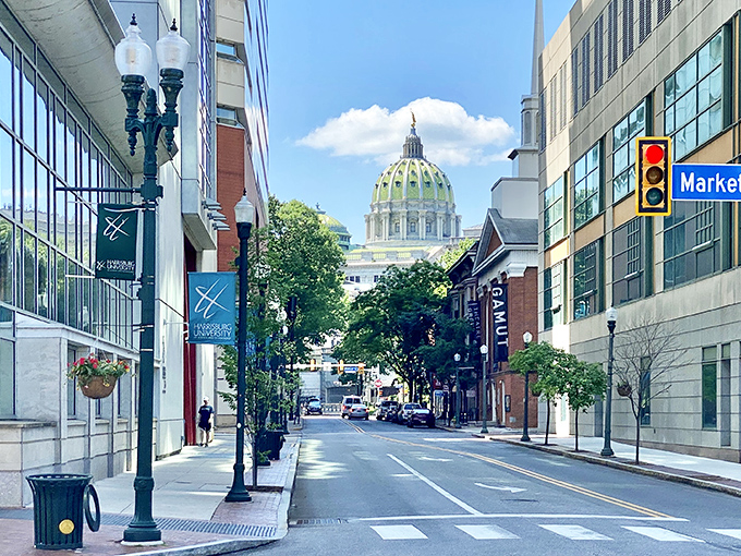 Downtown Harrisburg's Market Street view captures the Capitol dome playing peekaboo between modern buildings. History meets hustle!