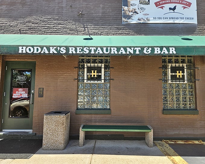 Hodak's green-trimmed windows and brick exterior &ndash; where chicken dreams come true and diet plans go to die.