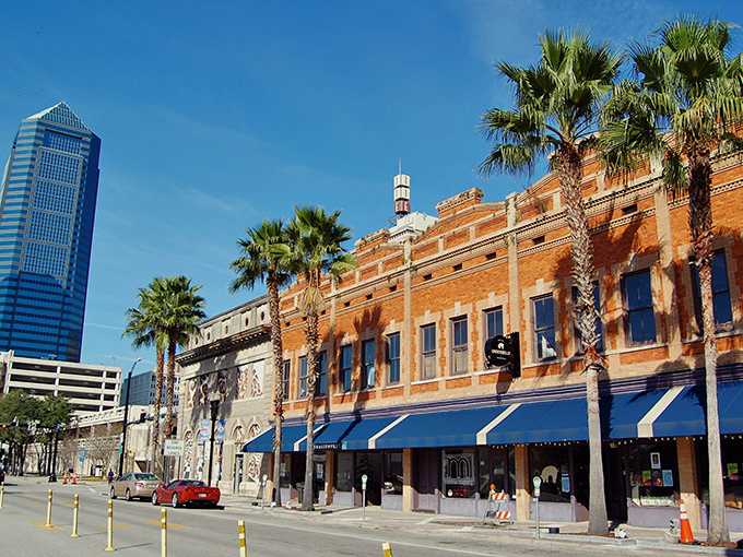 Historic brick buildings line Jacksonville's streets, where palm trees and old-world charm create an affordable oasis that won't drain your Social Security check.