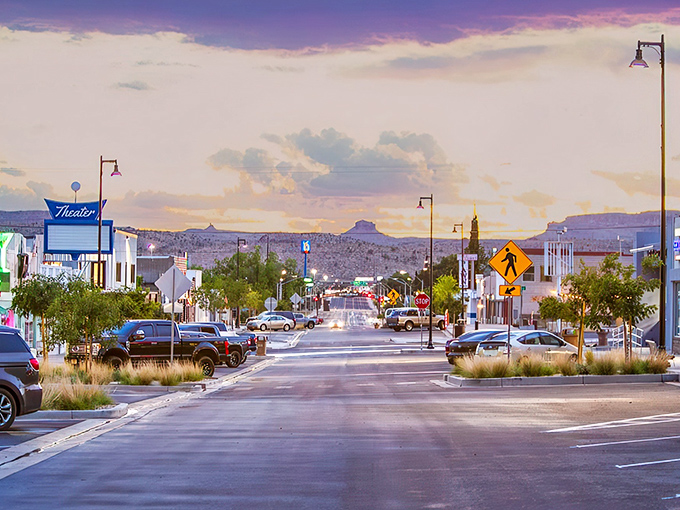 Downtown Kingman glows at twilight, where the mountains stand guard over a Main Street that seems plucked right out of a Western film.