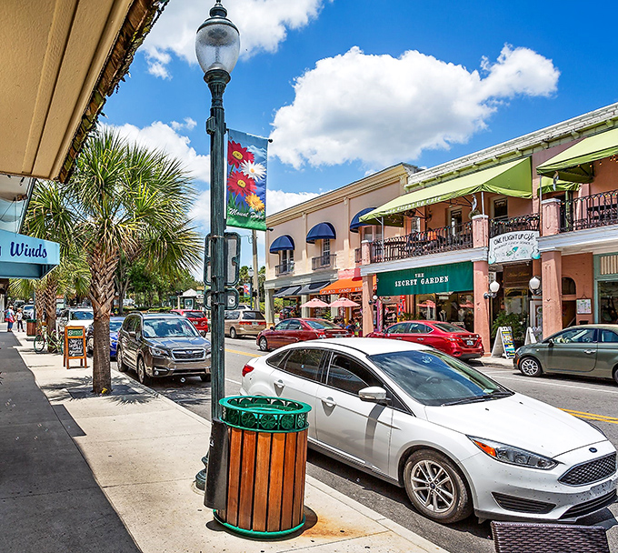 Palm trees and pastel storefronts create the perfect Florida small-town vibe that'll make you want to linger all afternoon.