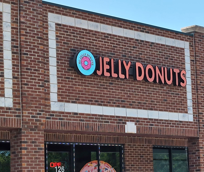 That iconic pink donut logo says it all&mdash;life's too short for bad pastries. Jelly Donuts' cheerful storefront makes morning commutes bearable.