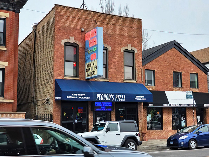 Pequod's storefront might be humble, but that caramelized crust inside is what pizza dreams are made of.