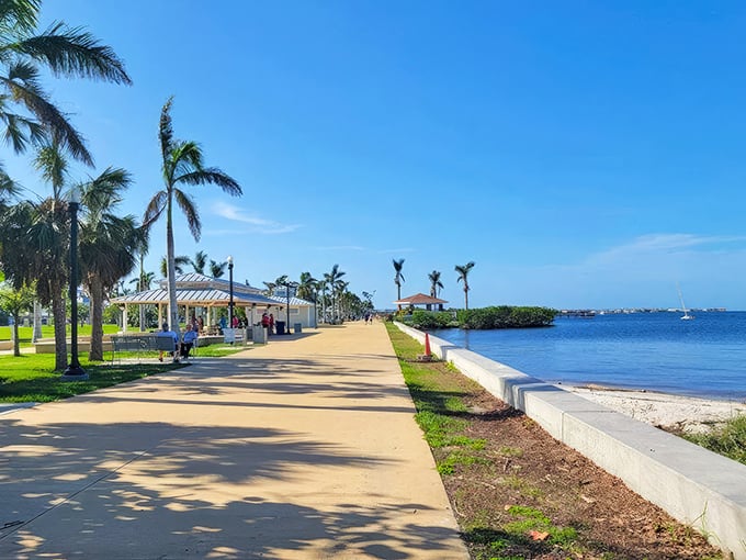 Palm trees and peaceful pathways along Punta Gorda's harborwalk&mdash;where retirement dollars stretch as far as the horizon.