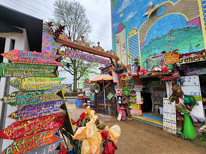 Welcome to Randyland, where every surface tells a story. These rainbow-drenched signs point to everywhere and nowhere at once.