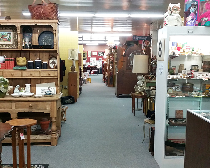 Grandma's attic meets organized chaos. This cozy corner of Roscoe Woodstock features wooden hutches that have witnessed more family dinners than Thanksgiving reruns.