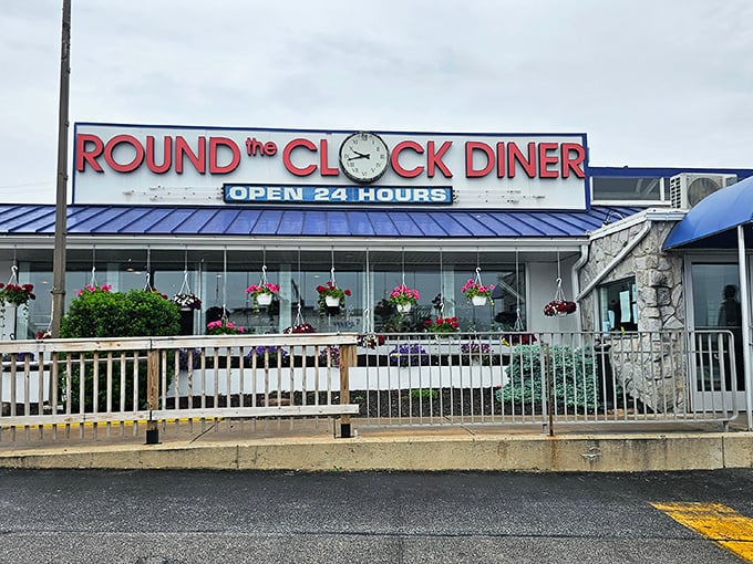 Hanging flower baskets add a touch of home to this 24-hour haven. Even at 3 AM, the coffee's fresh and the welcome's warm.