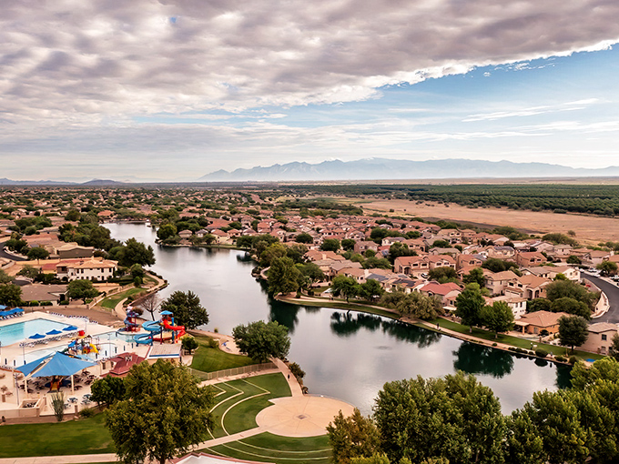 Sahuarita: Who needs a country club when your community has this? Affordable homes surrounding blue waters with desert mountains as your daily backdrop.