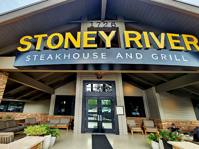 That bold yellow sign promises what lies within: a temple of perfectly aged beef where your steak dreams come true.