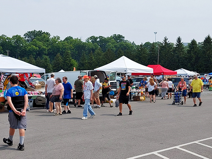 Bargain city under blue skies. Shoppers navigate the maze of tents and tables at Trader Jack's, where haggling is practically an Olympic sport.