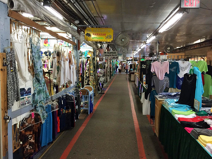 Red-lined pathways serve as your treasure map through this indoor bazaar. Hawaiian apparel beckons with tropical promises just steps away.