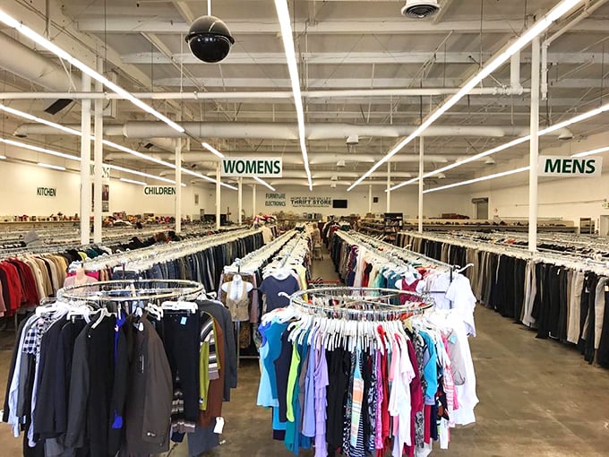 Organized chaos? Not here. Neatly arranged racks create a treasure hunter's paradise where your next favorite outfit awaits discovery.