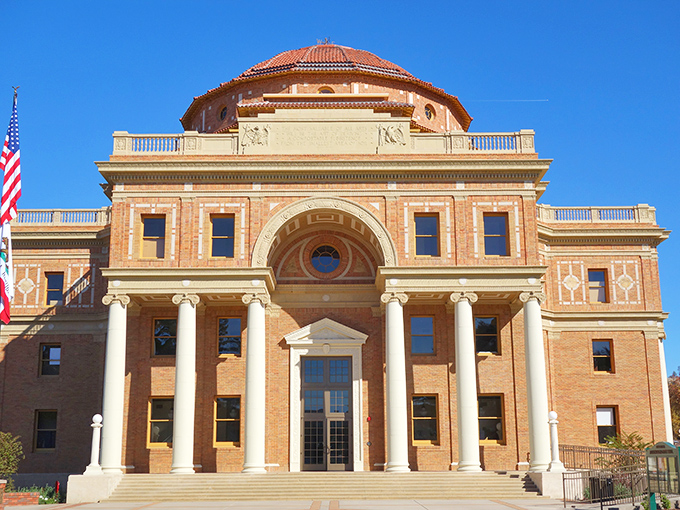 The magnificent Atascadero City Hall stands as a testament to the city's historic roots, its Italian Renaissance dome commanding attention against the blue sky.