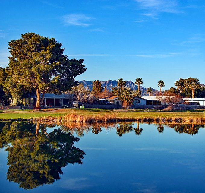 Mirror, mirror on the pond. Blythe's serene landscapes offer retirement-worthy reflections with mountain backdrops that rival expensive postcards.