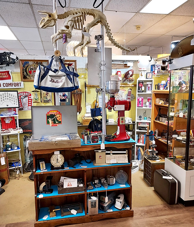 Where else can you shop for a Detroit duffle bag while a dinosaur skeleton keeps watch? This booth redefines eclectic merchandising.