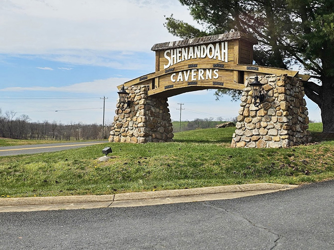 The stone archway entrance promises adventure, standing like a portal between our everyday world and the underground wonderland waiting below.