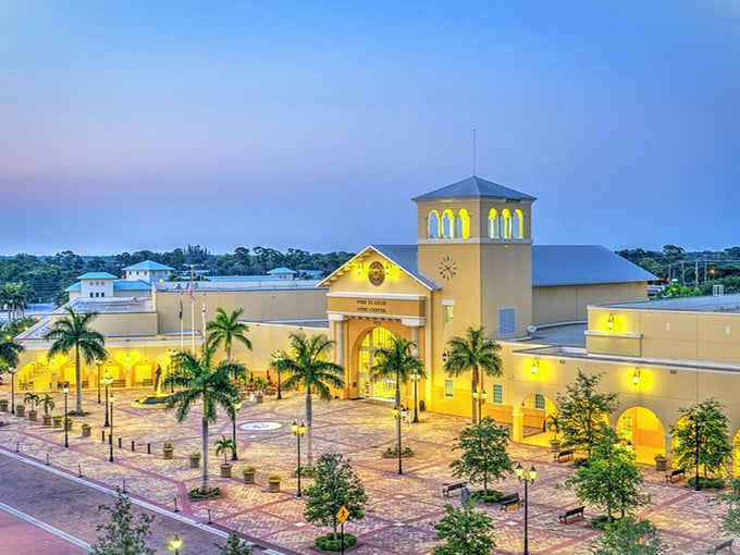 The Port St. Lucie Civic Center glows at dusk like a Mediterranean villa, hosting everything from concerts to craft fairs for budget-conscious entertainment seekers.