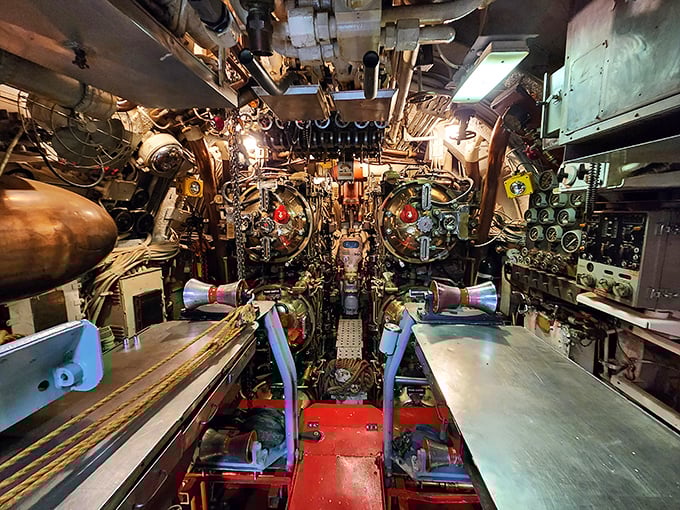 A symphony of dials, levers, and gauges &ndash; the submarine's control room looks like NASA mission control squeezed into a metal tube.