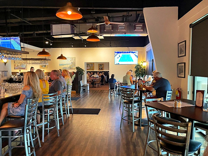 Inside, warm lighting and comfortable seating create the perfect atmosphere for memorable dining experiences.