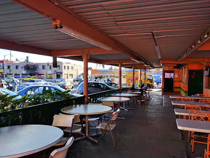 No white tablecloths needed here—just simple tables, plastic chairs, and the promise of authentic Mexican flavors under a practical covered patio.