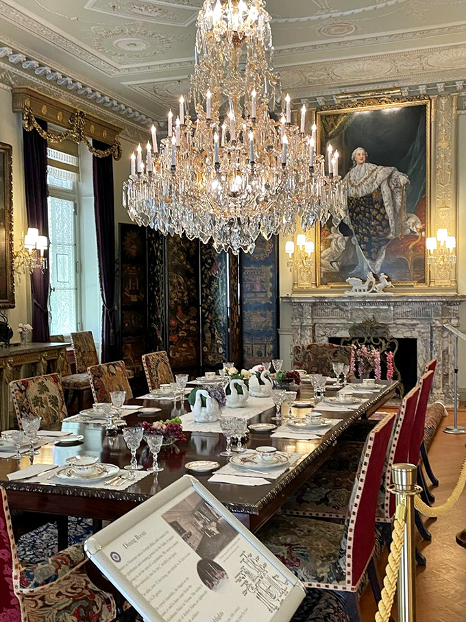 That chandelier isn't just lighting&mdash;it's jewelry for the ceiling. The dining table awaits guests who'll never arrive but are eternally expected. 