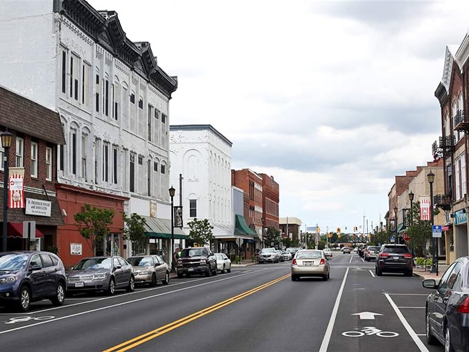 Downtown Fremont's architectural tapestry unfolds in white limestone and russet brick, creating a streetscape that Norman Rockwell would have rushed to paint.