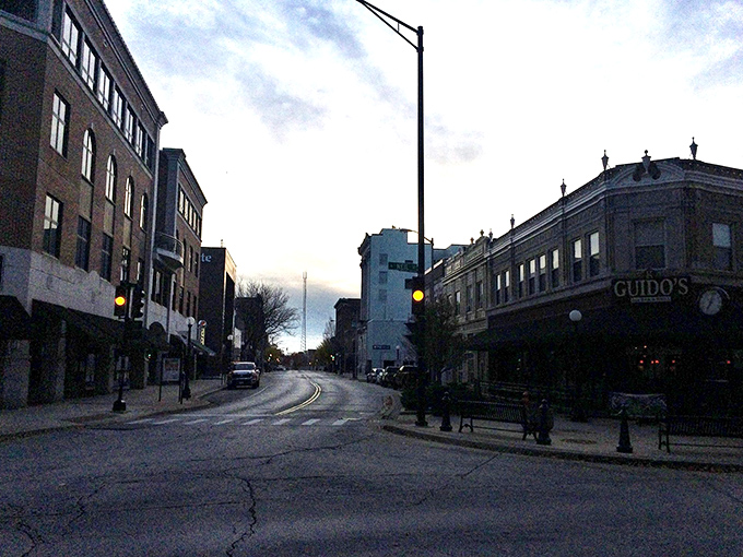 Twilight transforms downtown Champaign into a scene worthy of a nostalgic indie film, complete with twinkling street lamps and the promise of good conversation.