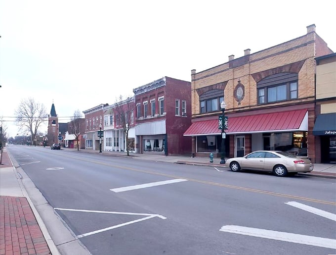 Downtown Ada's historic brick buildings stand shoulder to shoulder like old friends, their awnings offering shade to window-shoppers on a quiet afternoon.