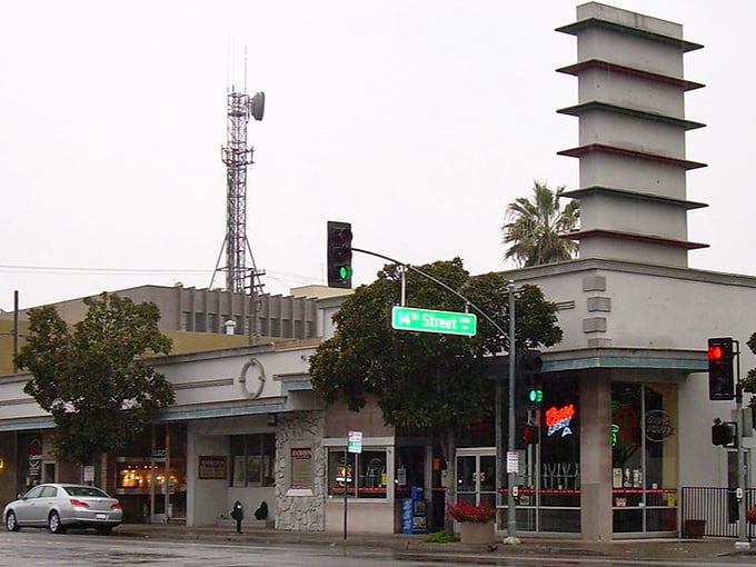 The corner of J Street showcases Modesto's blend of Art Deco and mid-century design elements, where local businesses thrive under the California sun.