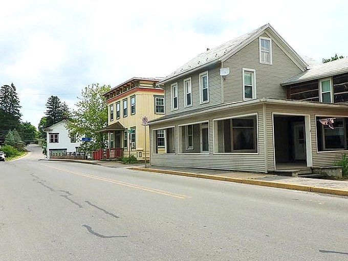Main Street climbs gently upward, inviting you to discover what treasures await around the bend.