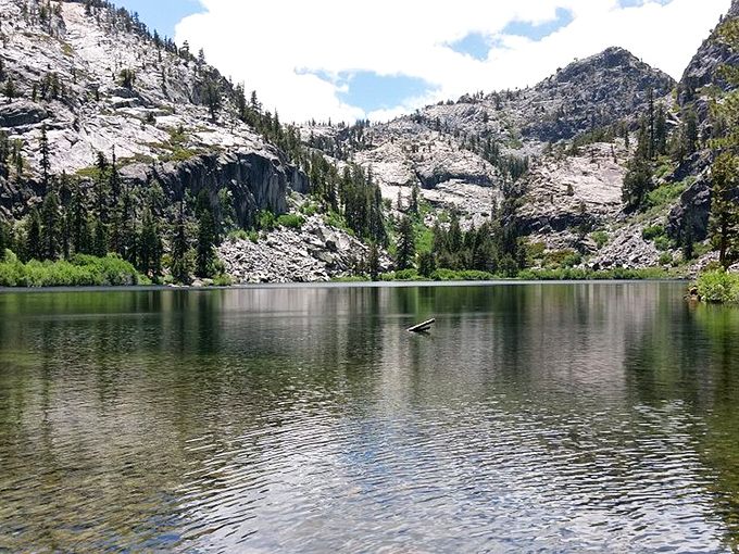 Mirror, mirror on the lake: Eagle Lake's glass-like surface perfectly reflects the surrounding granite peaks, creating nature's ultimate infinity pool.