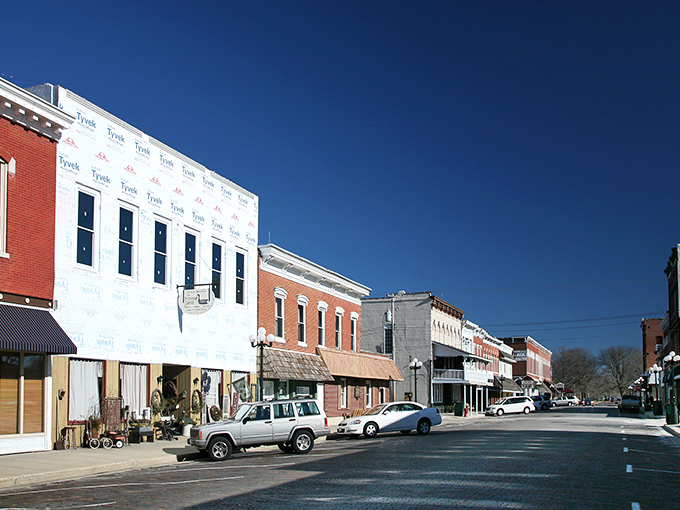 The well-preserved commercial buildings along East Main Street showcase architectural styles from a bygone era when downtown was everyone's destination, not just a nostalgic detour.