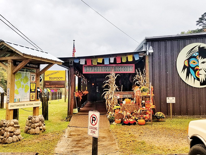 Fall decorations welcome curious minds to this temple of the unexplained. The "No Clowning Zone" sign is presumably to keep Pennywise from stealing Bigfoot's thunder.