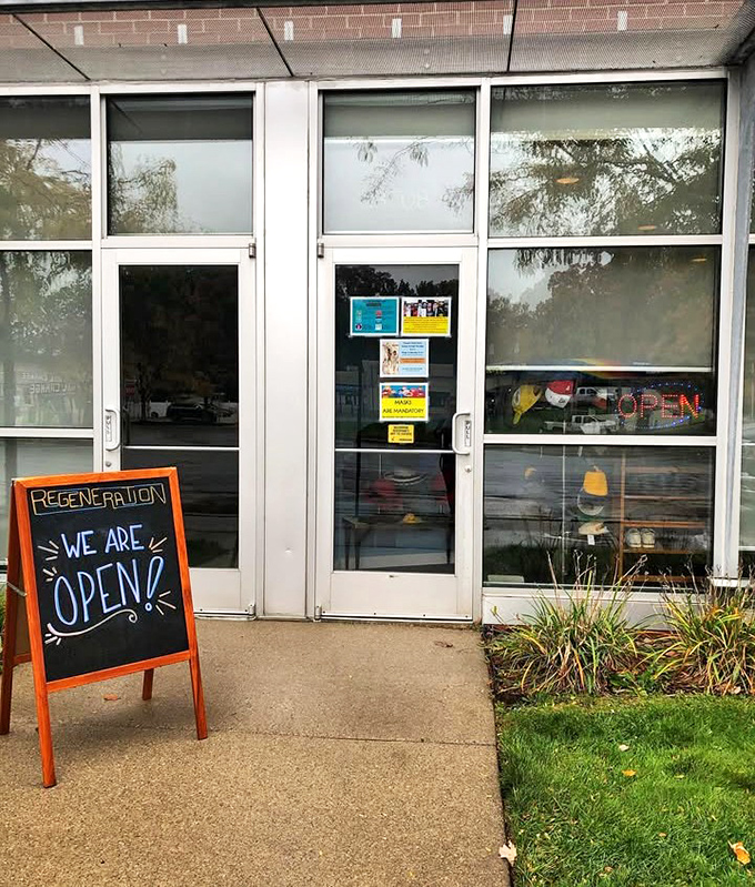 The friendly "WE ARE OPEN!" chalkboard welcomes you like a neighbor inviting you over for coffee and surprises.