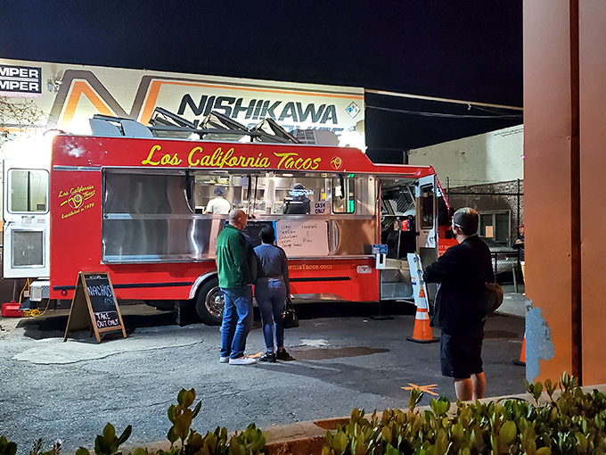 As night falls, the glow of this taco truck becomes a lighthouse for hungry souls, guiding them to a corner of Pasadena where flavor reigns supreme.