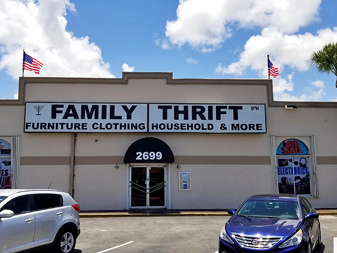 American flags flutter proudly above the entrance, as if announcing "Your next conversation piece is waiting just beyond these doors!"